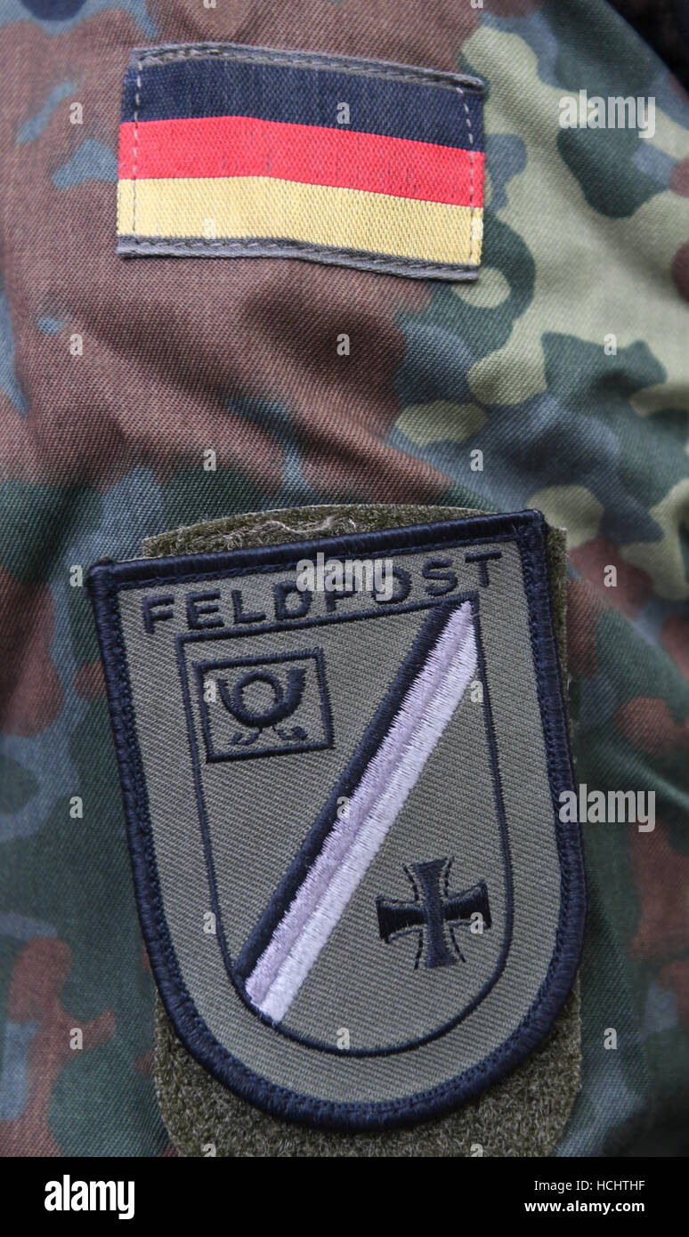 The badge of an army postal service soldier can be seen at the army ...