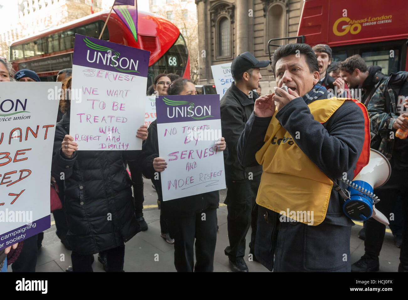 London, UK. 9th December 2016. Unison cleaners and supporters hold an ...