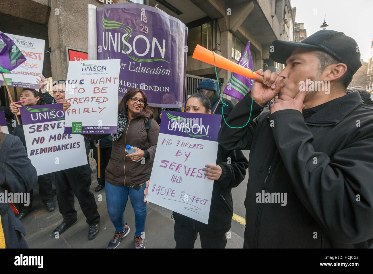 London, UK. 9th December 2016. Unison cleaners with posters, banners ...