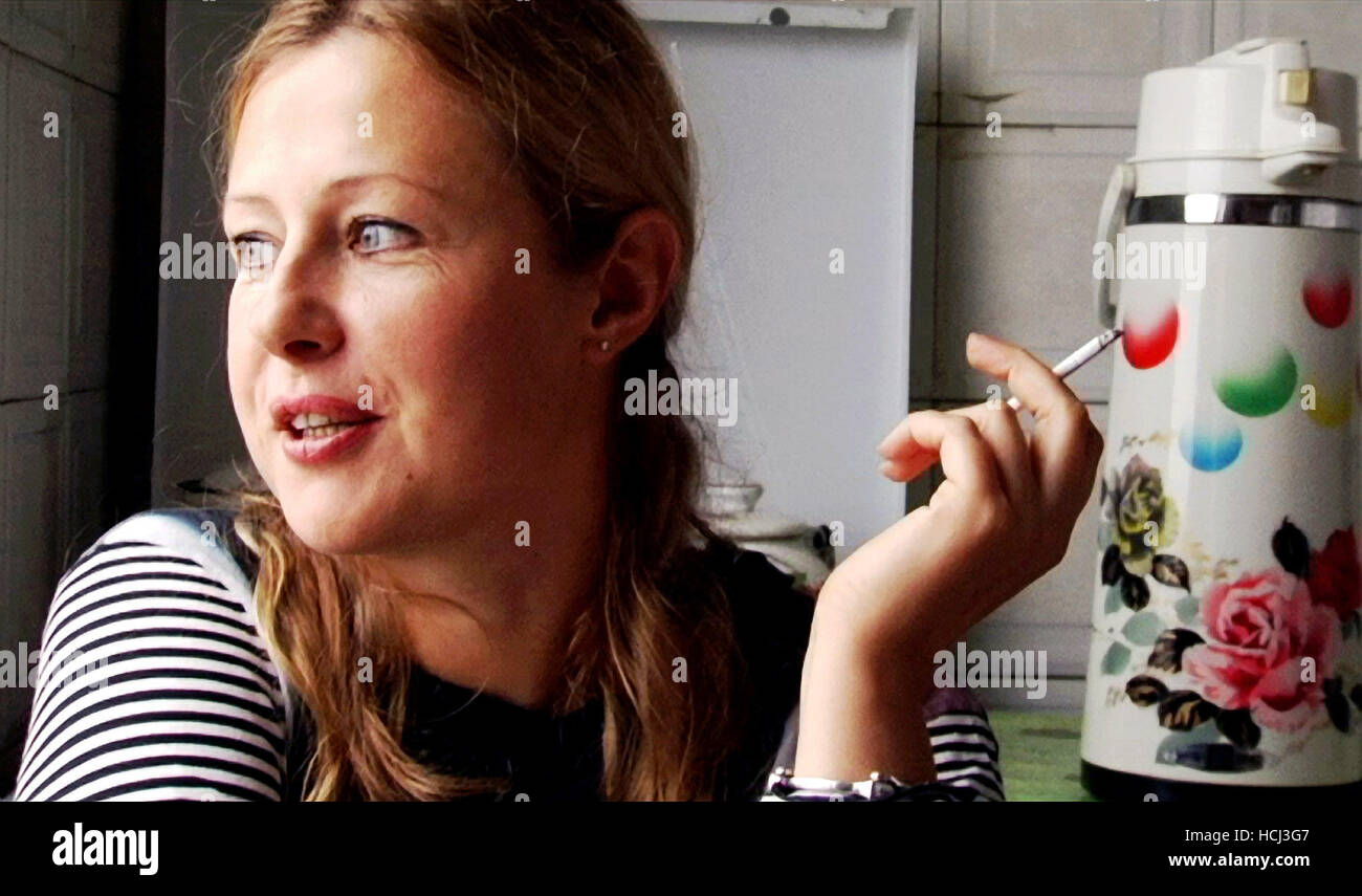 MY PERESTROIKA, Olga smoking in her kitchen in Moscow, 2010. ©Red ...