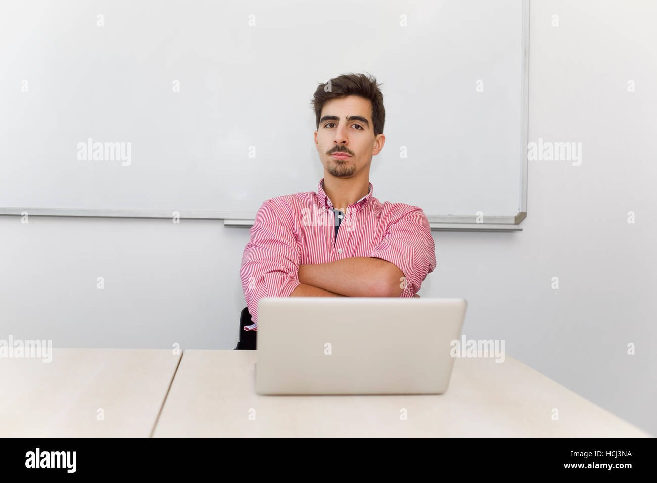 Bored student in classroom hi-res stock photography and images - Alamy