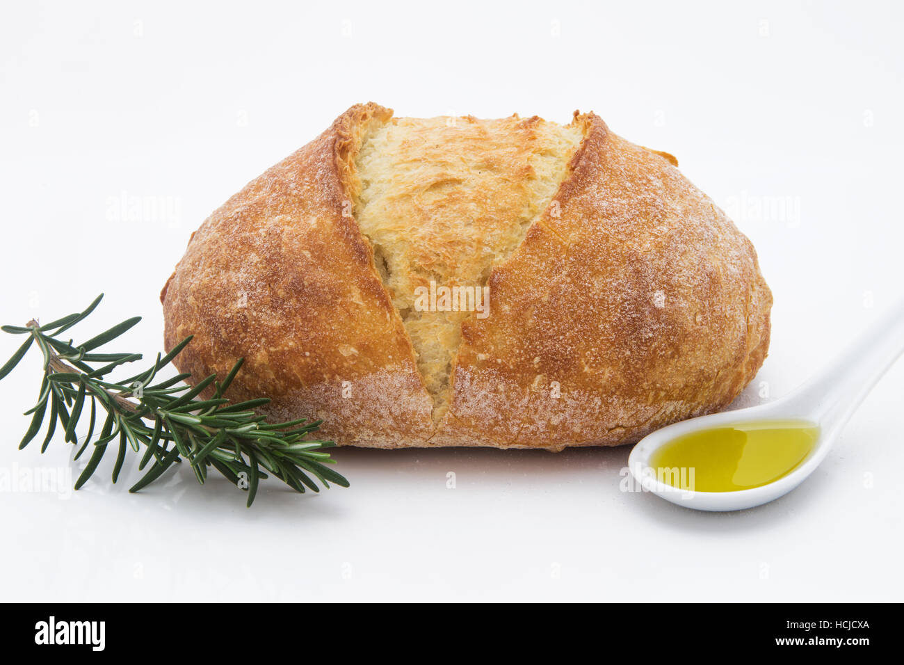 White Italian delicious artisan bread with olive oil on a white ...