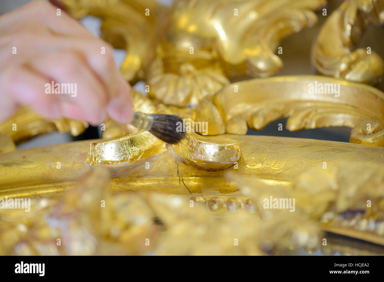 Gold plated hands hi-res stock photography and images - Alamy