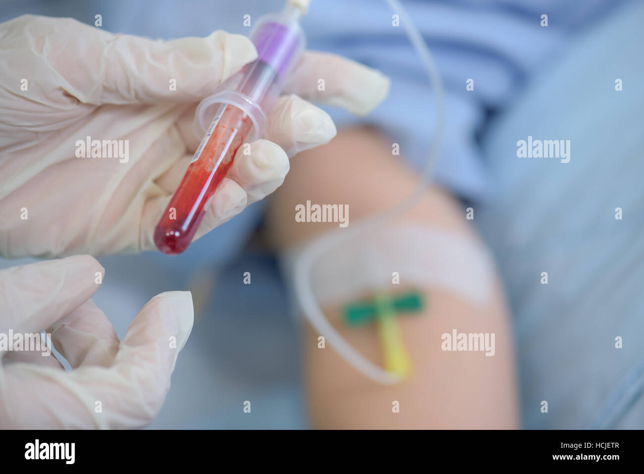 extracting blood from patient Stock Photo - Alamy