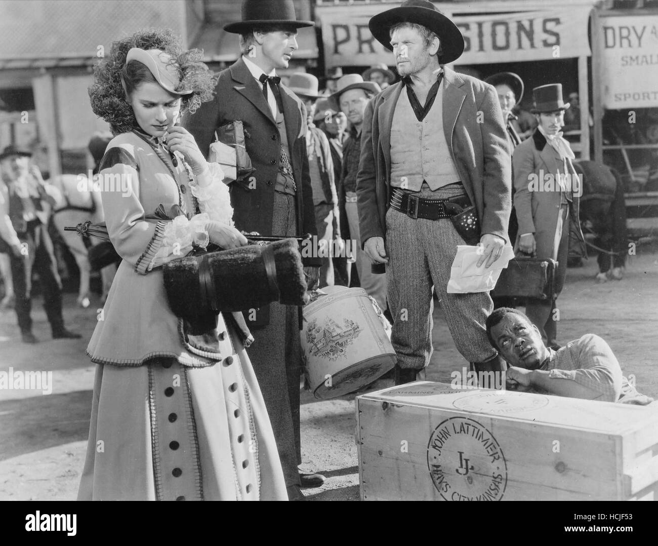 THE PLAINSMAN, foreground from left: Helen Burgess, Gary Cooper ...
