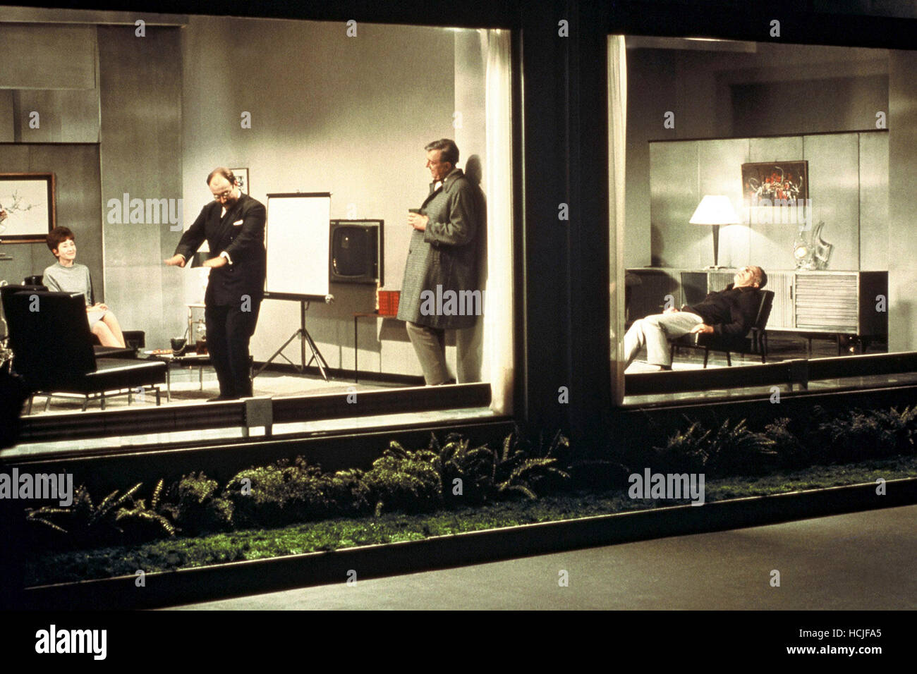 PLAYTIME, Jacques Tati (standing, third from left, in raincoat), 1967 ...