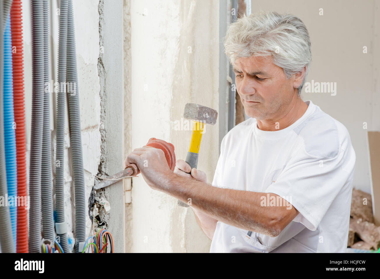 Chiseling of plaster hi-res stock photography and images - Alamy