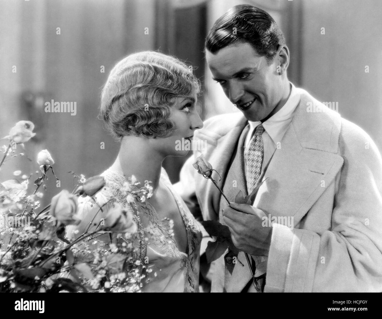 PLEASURE CRAZED, from left: Dorothy Burgess, Kenneth MacKenna, 1929. TM ...