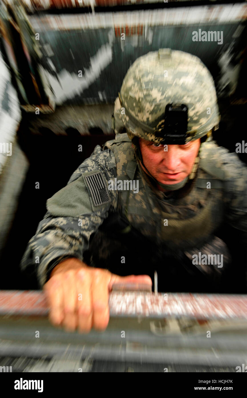 A soldier demonstrates body armor can be light and maneuverable ...