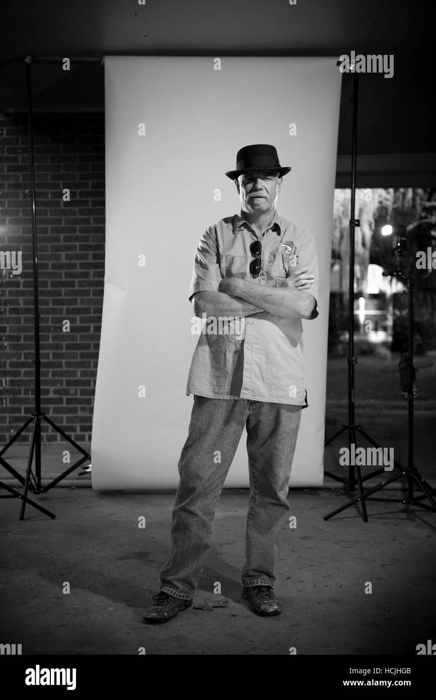 Male wearing black Black and White Stock Photos & Images - Alamy