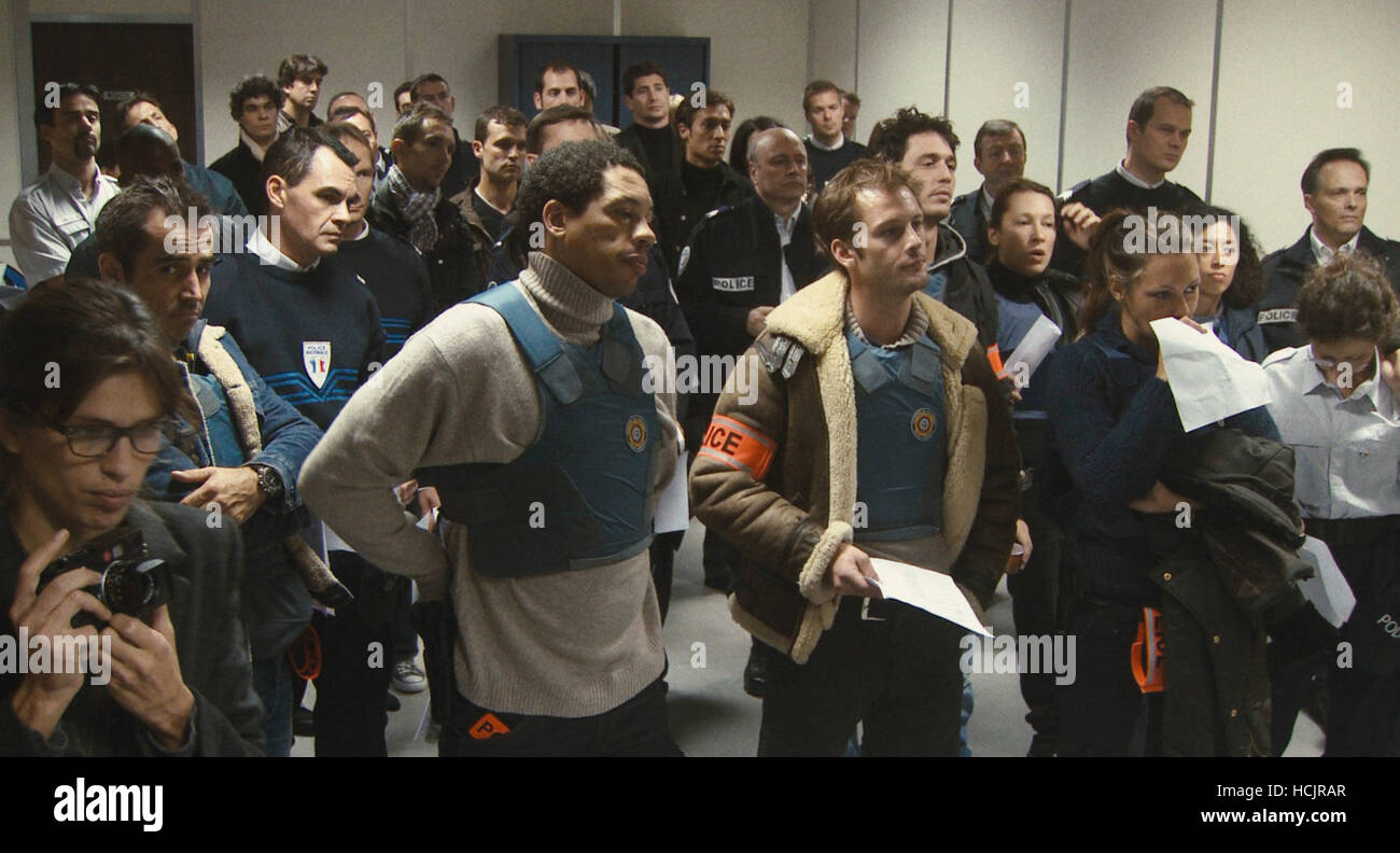 POLISSE, Joey Starr (left of center), Nicolas Duvauchelle (right of ...