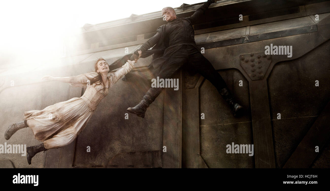 PRIEST, l-r: Lily Collins, Paul Bettany, 2011, ph: Scott Garfield ...