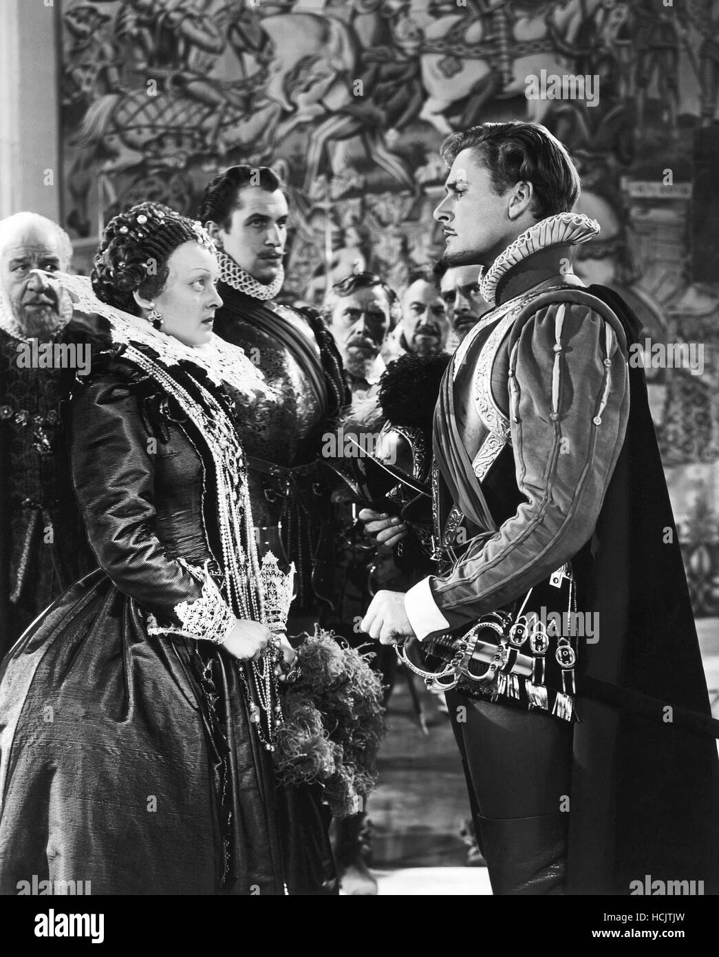 THE PRIVATE LIFES OF ELIZABETH AND ESSEX, front from left: Bette Davis ...