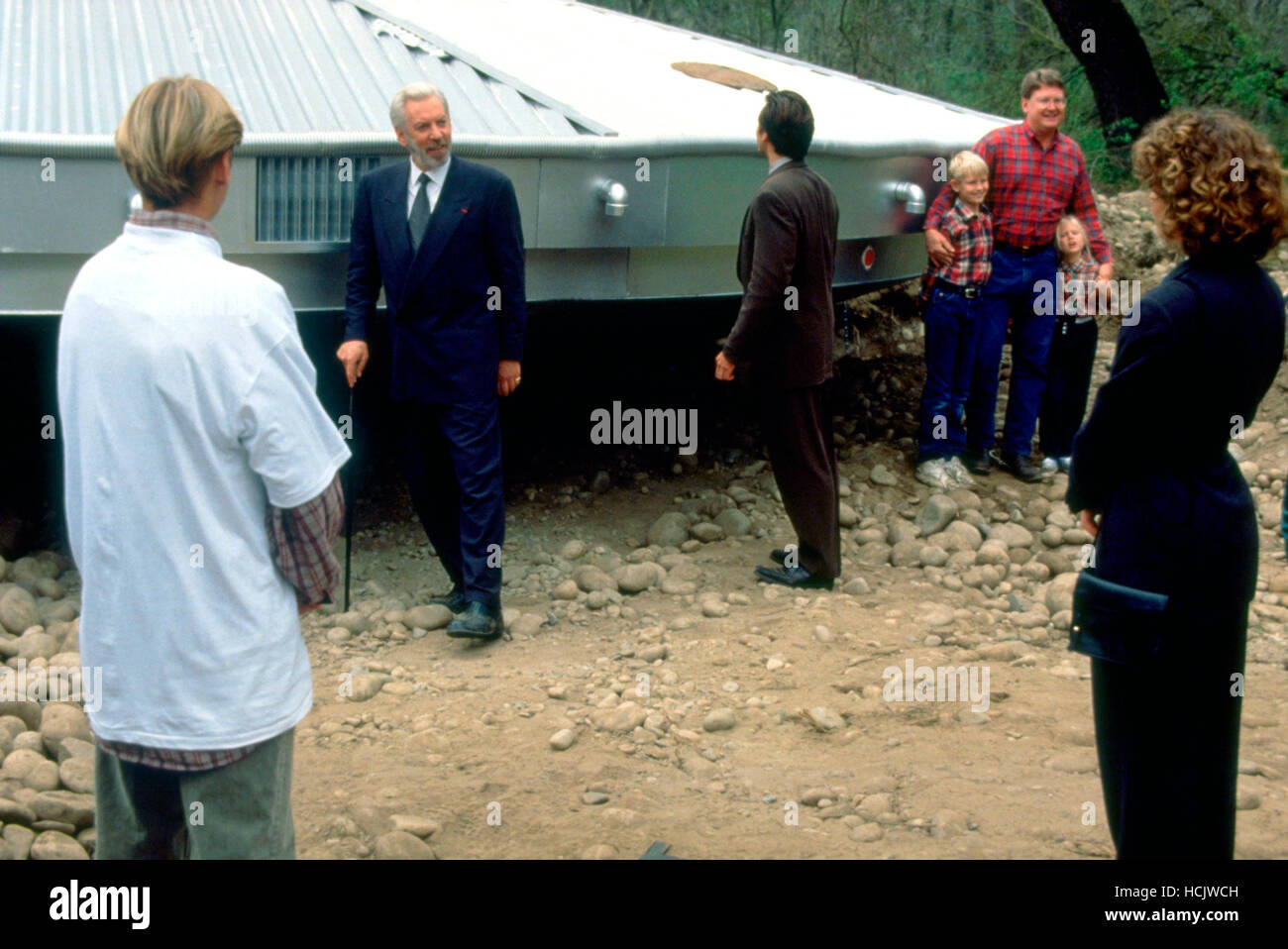 THE PUPPET MASTERS, Donald Sutherland (cane), Julie Warner (right front ...