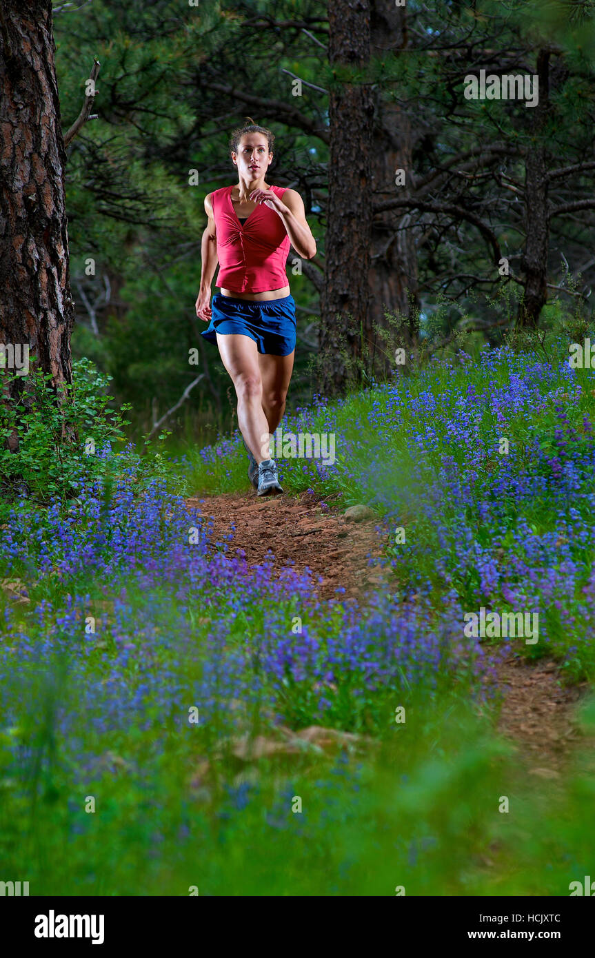 Laura Shultz trail running in Lefthand Canyon near Boulder, CO Stock ...