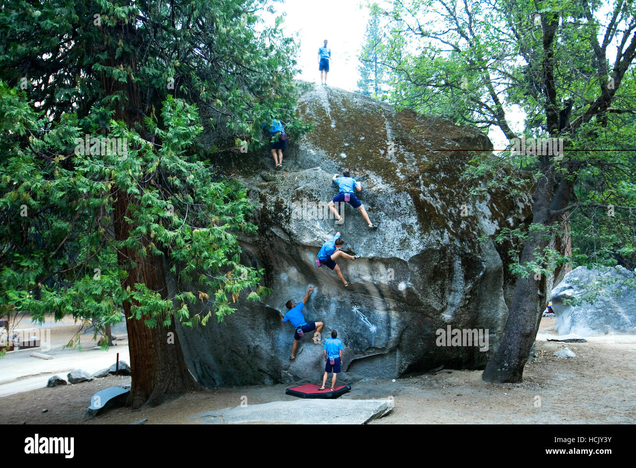 A composite of Tommy Caldwell, famous big wall climber, working on a ...