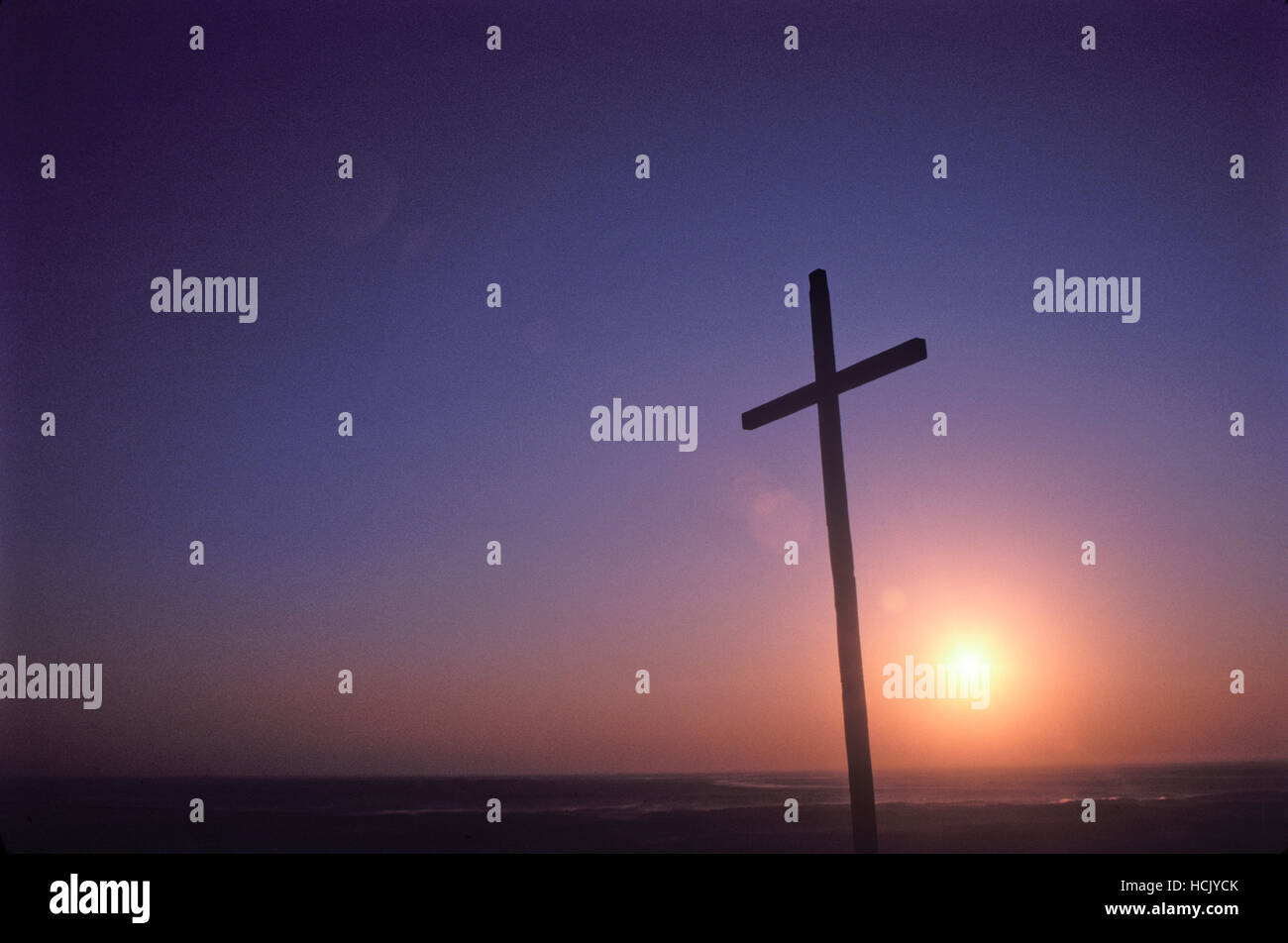 A Christian cross sees the sunrise first on easter Sunday morning from ...