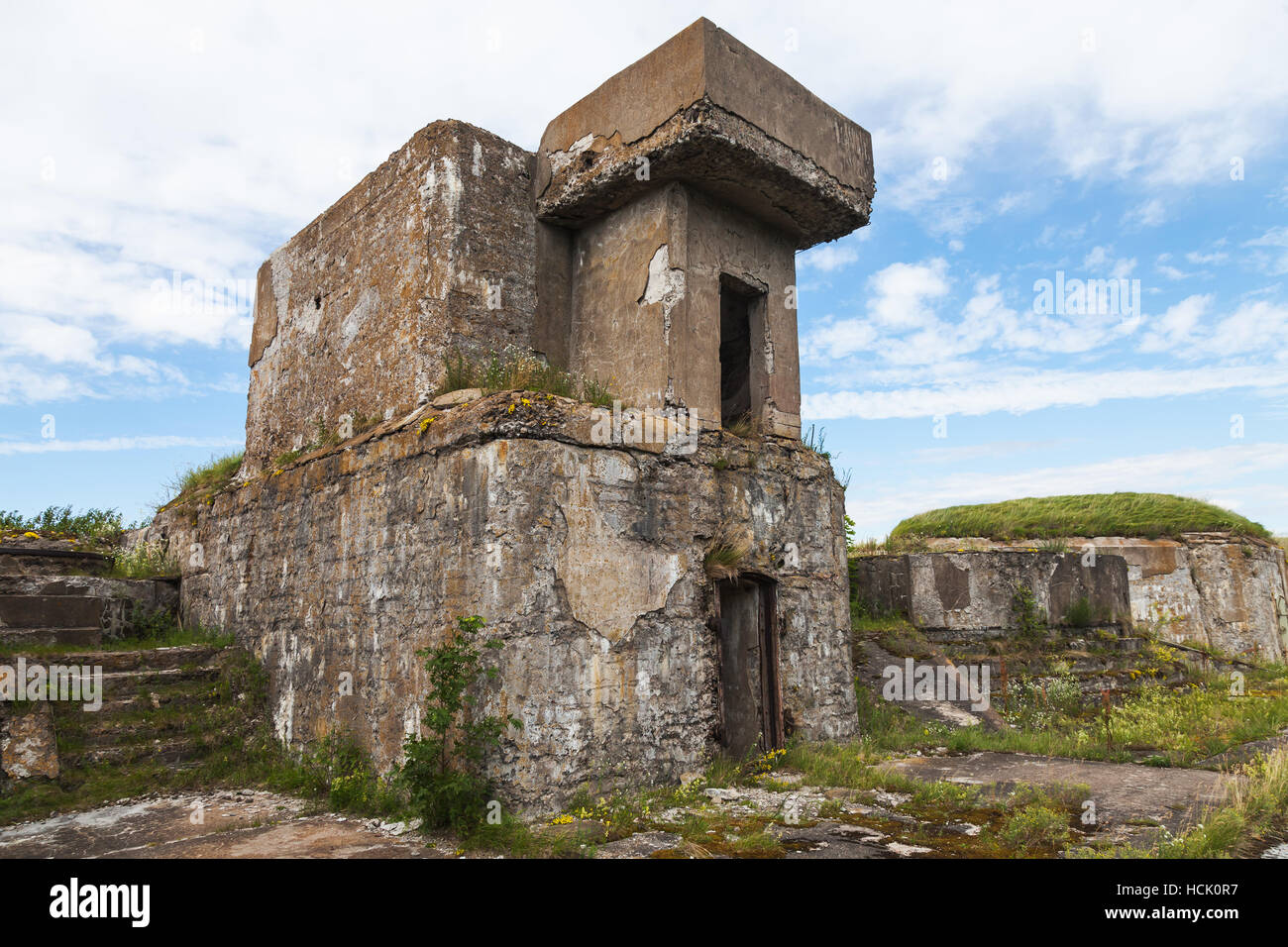 Facade of an old abandoned concrete bunker from WWII period on Totleben ...