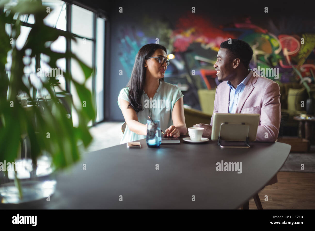 Businessman businesswoman interacting other hi-res stock photography ...
