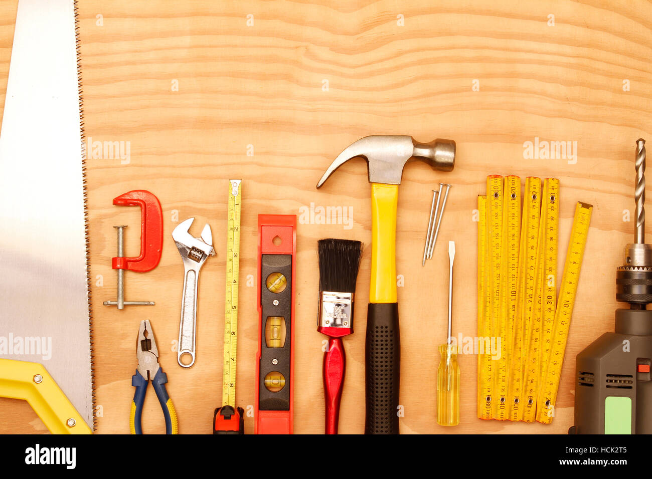 Assorted work tools on wood Stock Photo - Alamy