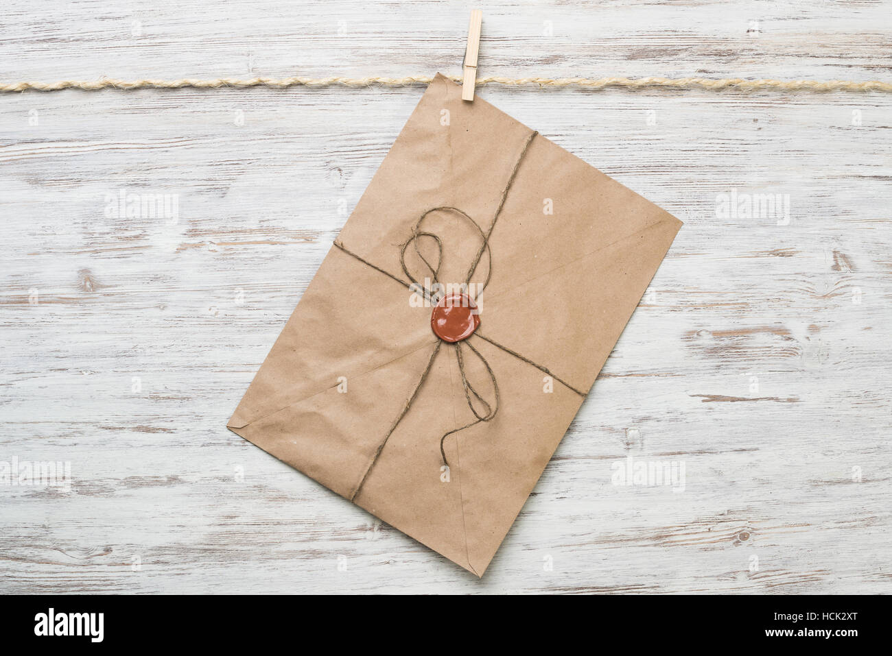 Mail envelope on rope Stock Photo - Alamy