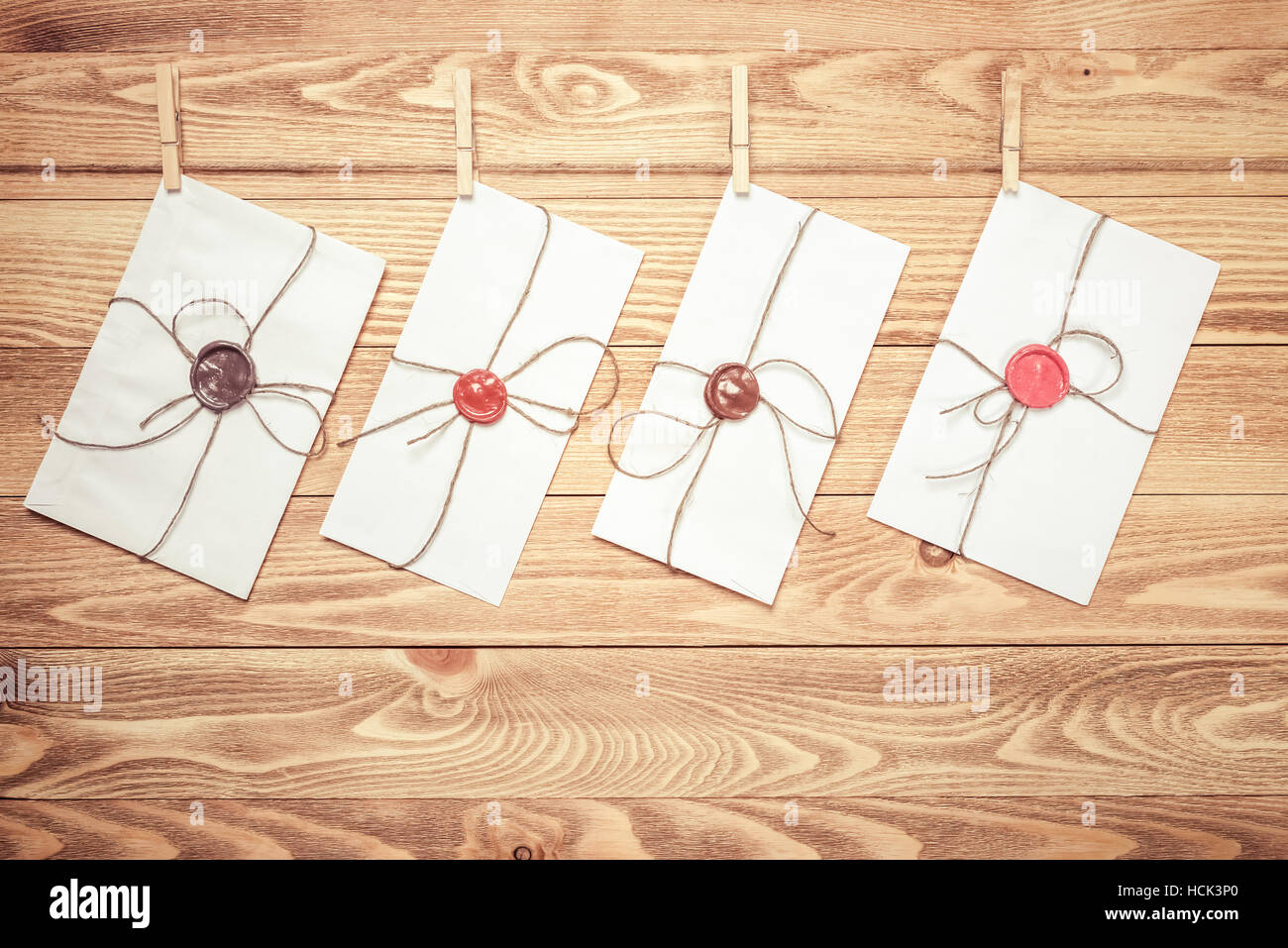 Mail envelope on rope Stock Photo - Alamy