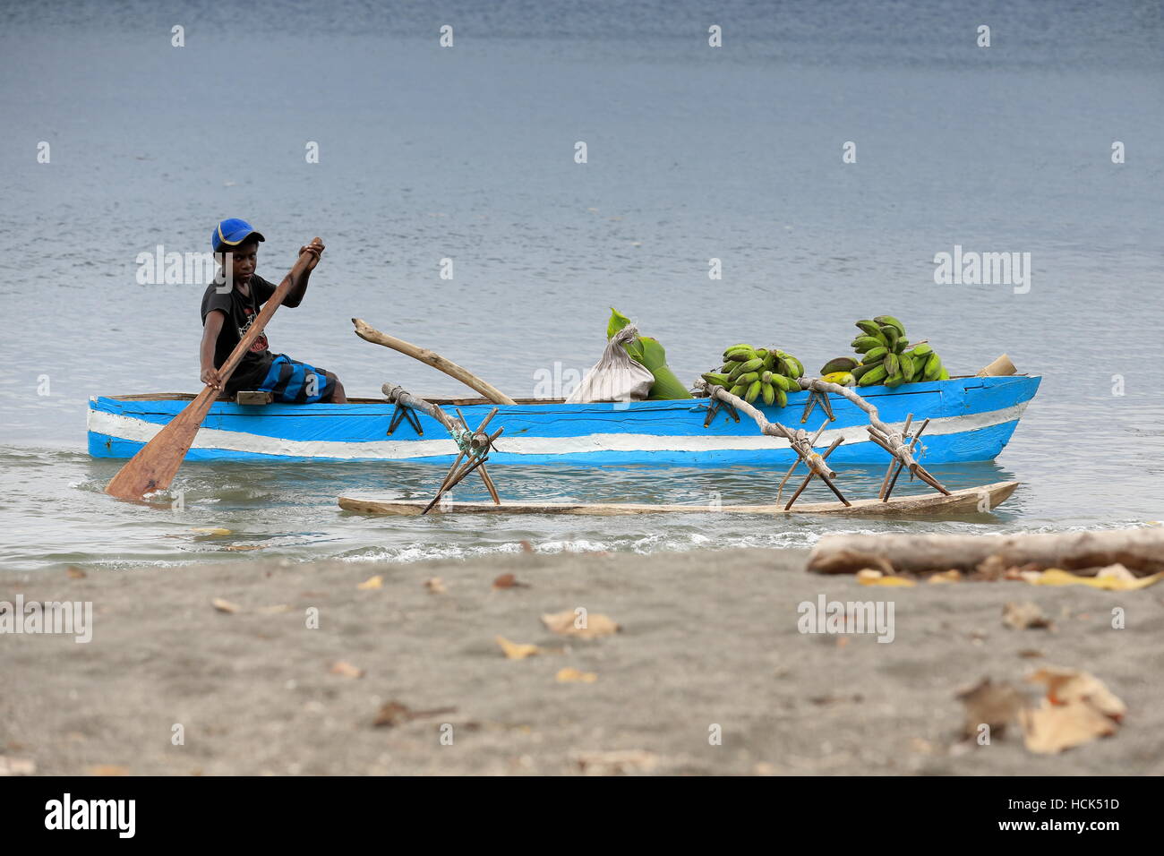 Old outrigger canoe on beach hi-res stock photography and images - Alamy