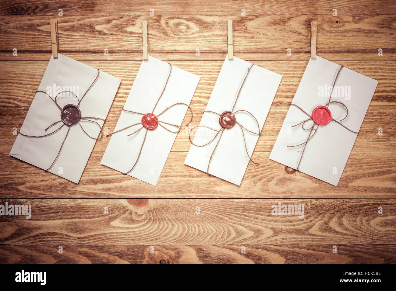 Mail envelope on rope Stock Photo - Alamy