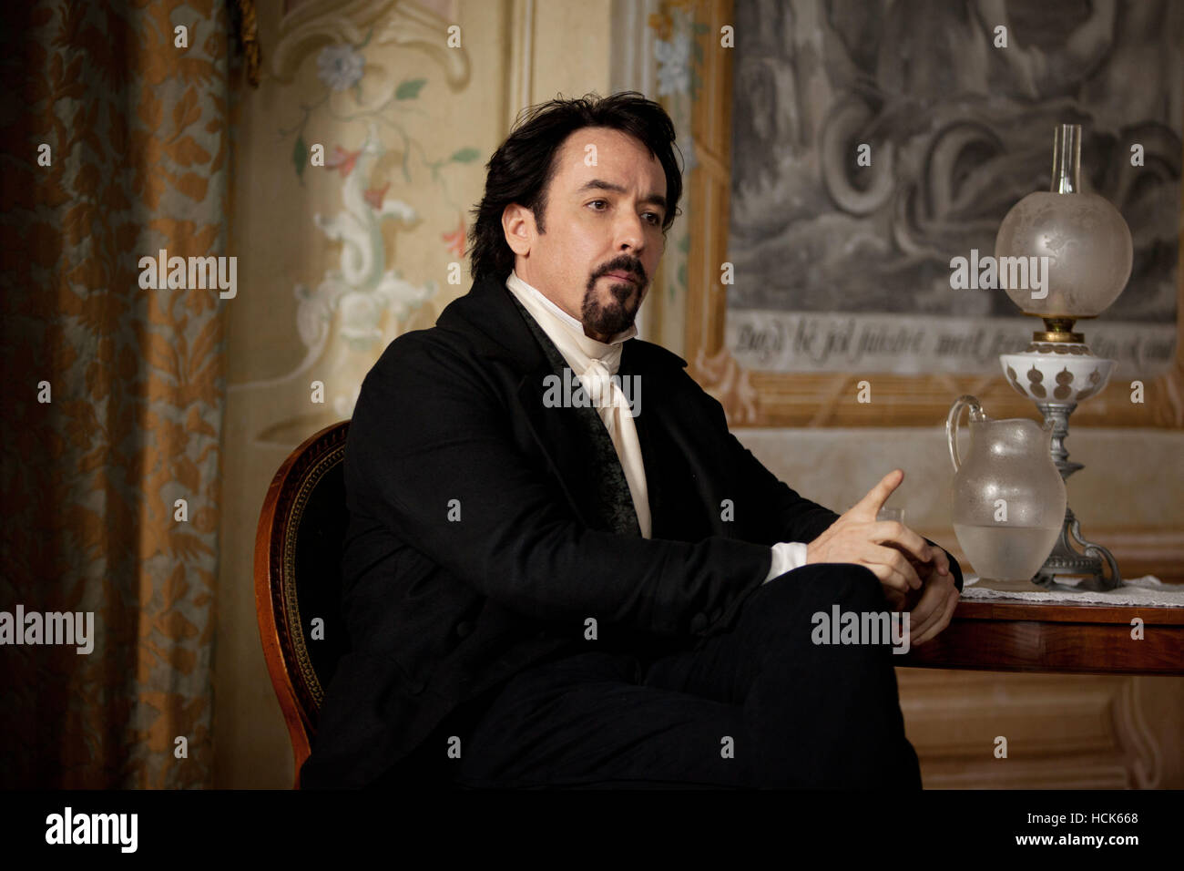 THE RAVEN, John Cusack, as Edgar Allan Poe, 2012. Ph: Larry Horricks ...