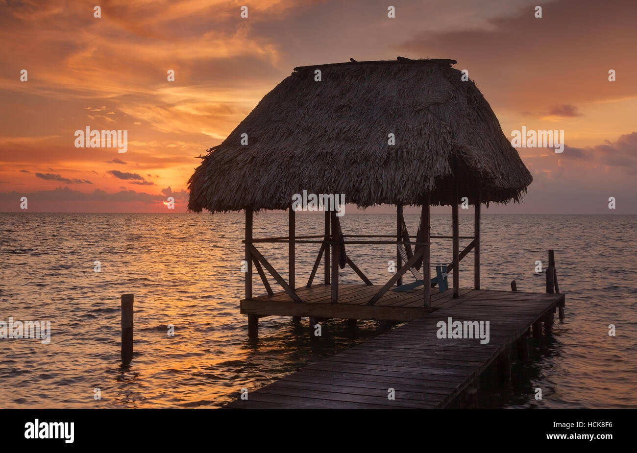 Belize Hut During Sunset Stock Photo - Alamy