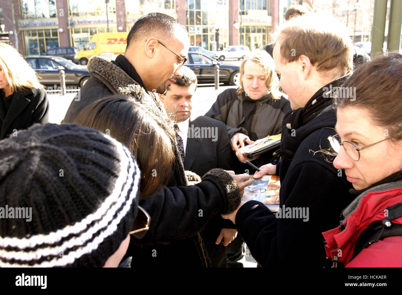 The Rock signing autographs at the German premiere of THE RUNDOWN, 2004 ...