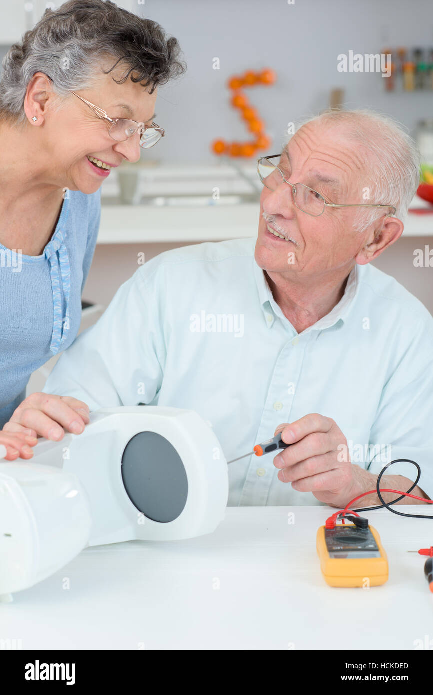 Woman repairing coffee machine hi-res stock photography and images - Alamy