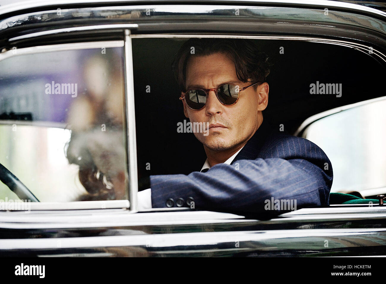 PUBLIC ENEMIES, Johnny Depp as John Dillinger, 2009. Ph: Peter Mountain ...