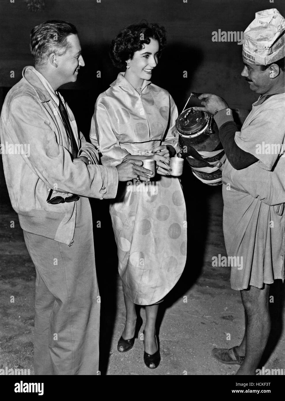 QUO VADIS, director Mervyn LeRoy (left) with visitor Elizabeth Taylor ...