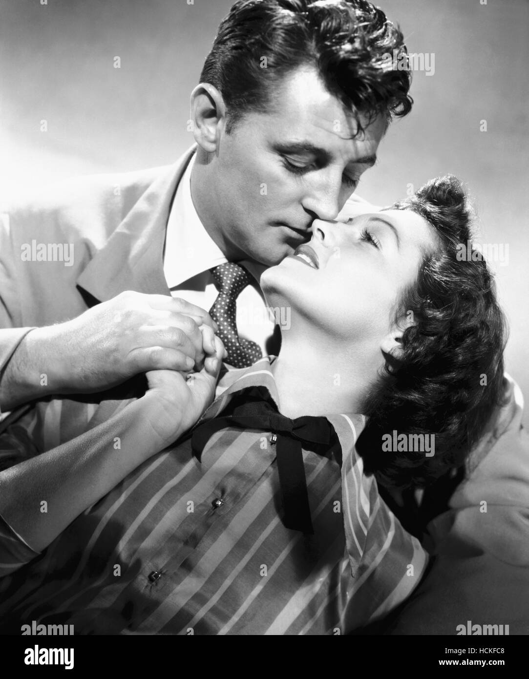 THE RACKET, Robert Mitchum, Joyce Mackenzie, 1951 Stock Photo - Alamy