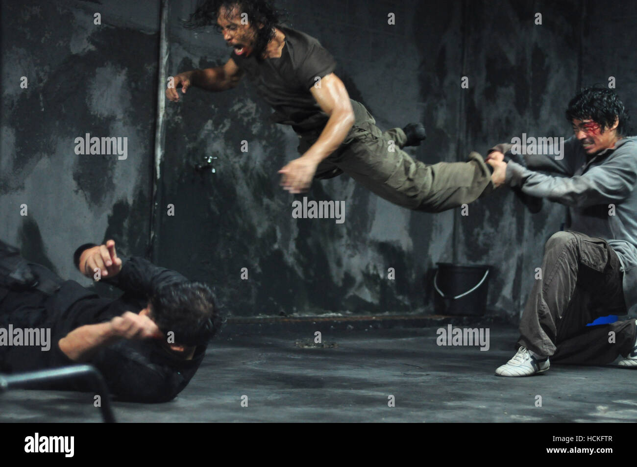 THE RAID: REDEMPTION, (aka THE RAID, aka SERBUAN MAUT), from left ...