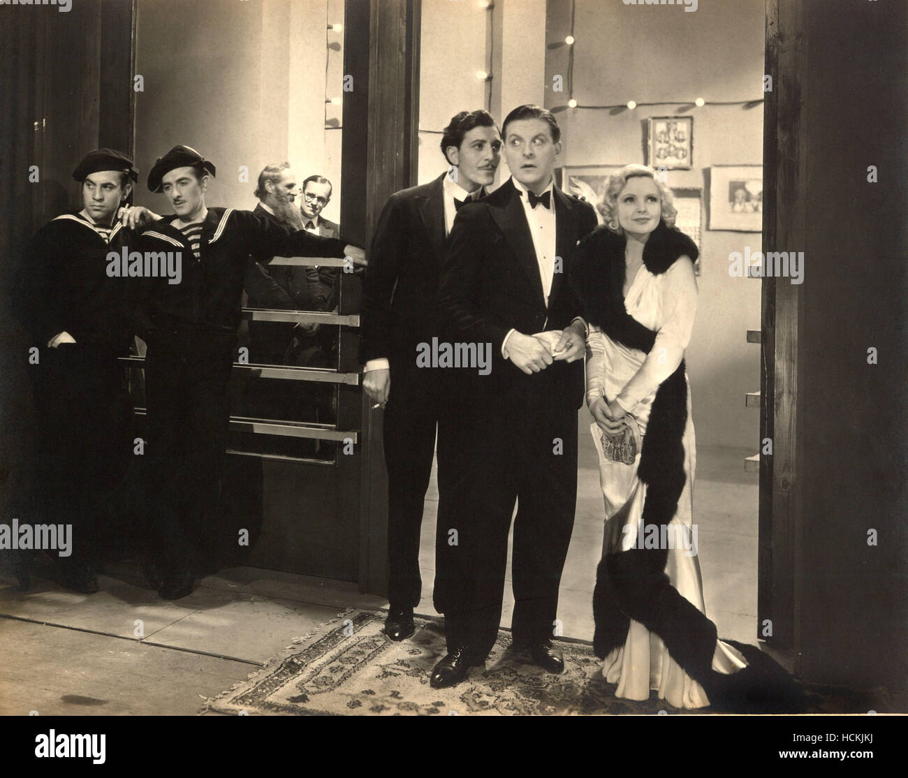 RICH AND STRANGE, Henry Kendall (second from right), Joan Barry (far ...