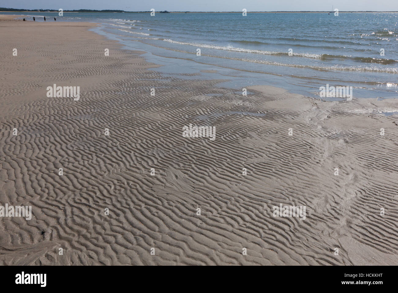 Ripples in the wet sand of a beach Stock Photo - Alamy
