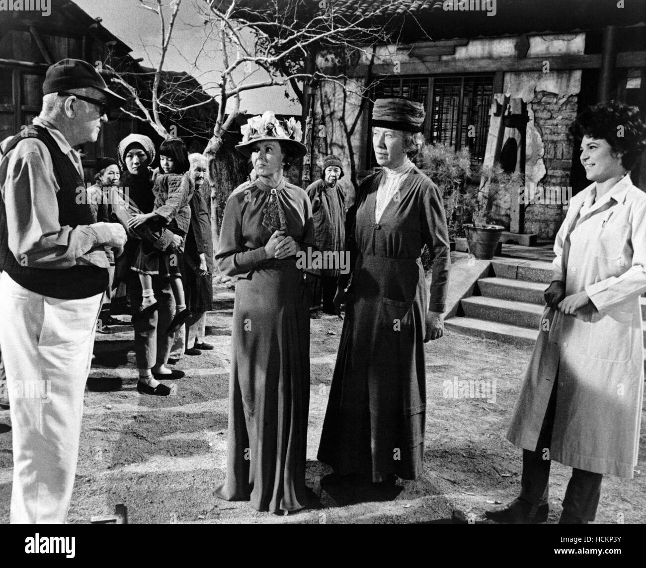 7 WOMEN (aka SEVEN WOMEN), foreground from left: director John Ford ...