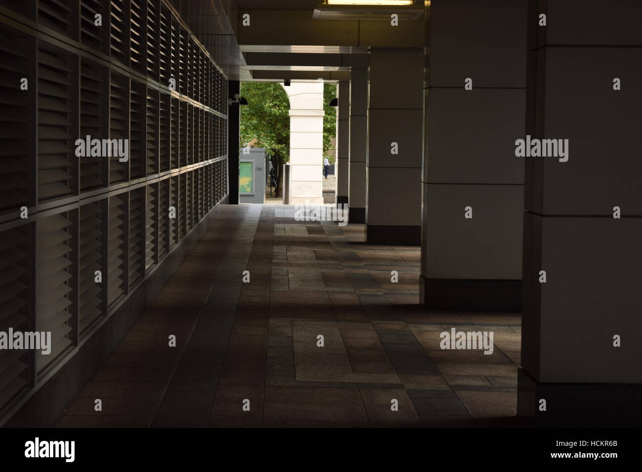 long hallway in a university leading outside Stock Photo - Alamy