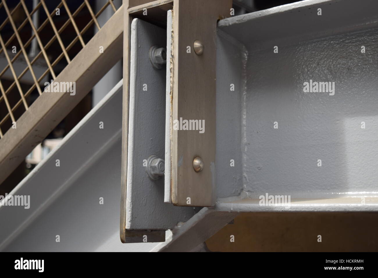 Close-up of metallic foundation of wooden stairs Stock Photo - Alamy