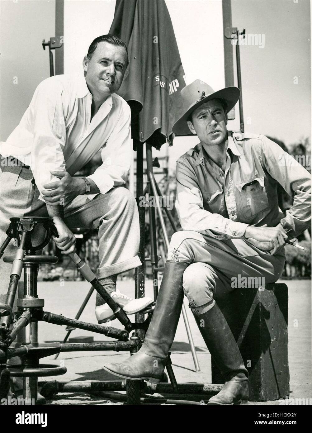 THE REAL GLORY, from left: director Henry Hathaway, Gary Cooper, on set ...