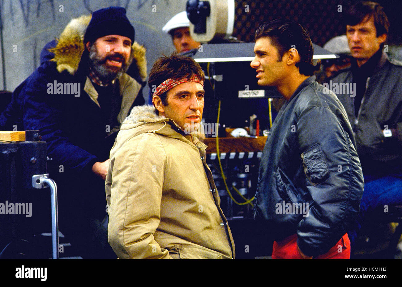 SCARFACE, Director Brian De Palma, Al Pacino, Steven Bauer on set, 1983 ...