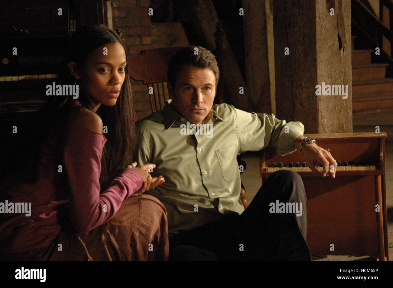 THE SKEPTIC, from left: Zoe Saldana, Tim Daly, 2009. Ph: Chris Shields ...