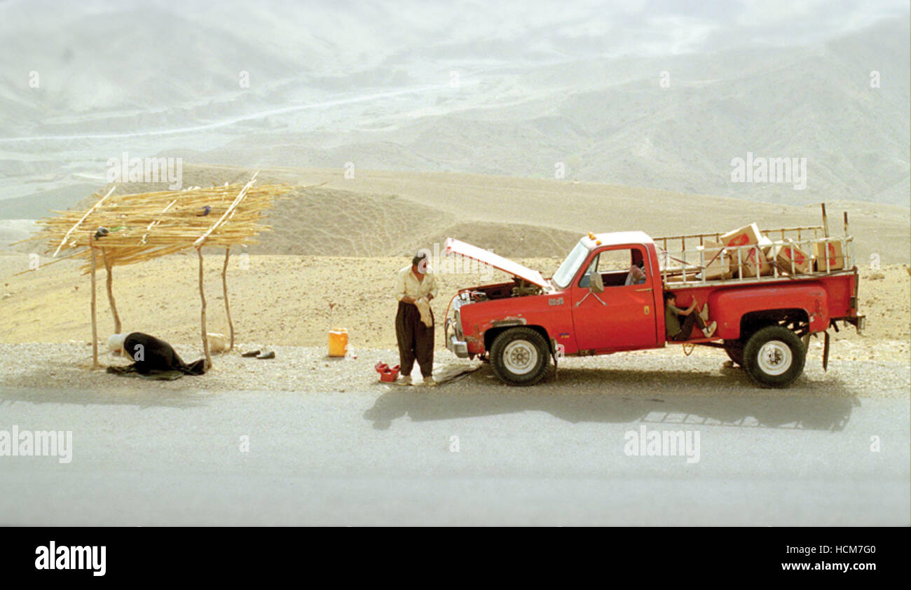 SON OF BABYLON, Shazada Hussein (left), Yasser Talib (right, in car ...