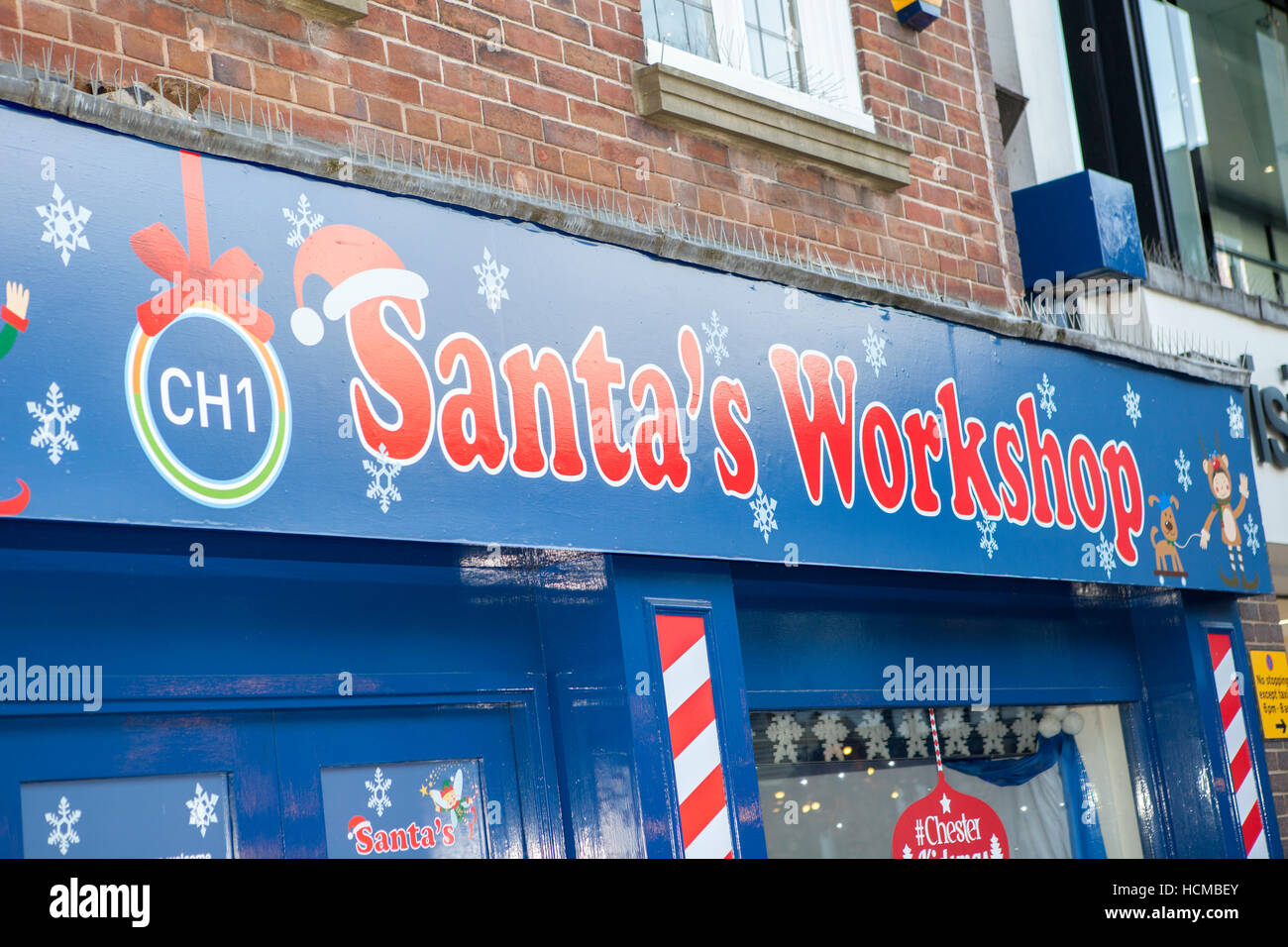 Santa's Workshop Shop, signs, and shoppers in the retail sector of the ...