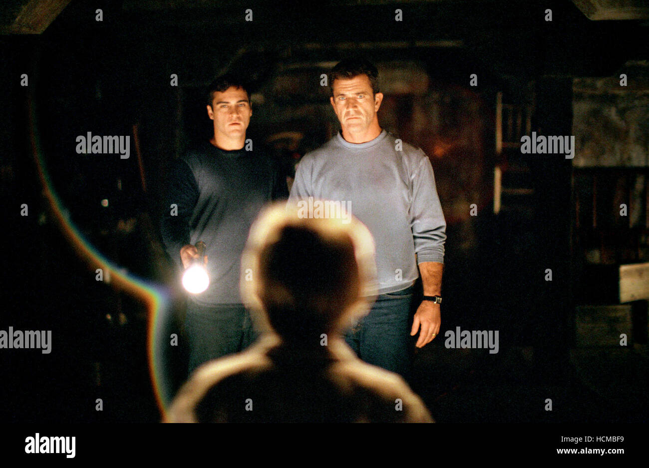 SIGNS, Joaquin Phoenix, Mel Gibson, 2002, (c) Walt Disney/courtesy ...