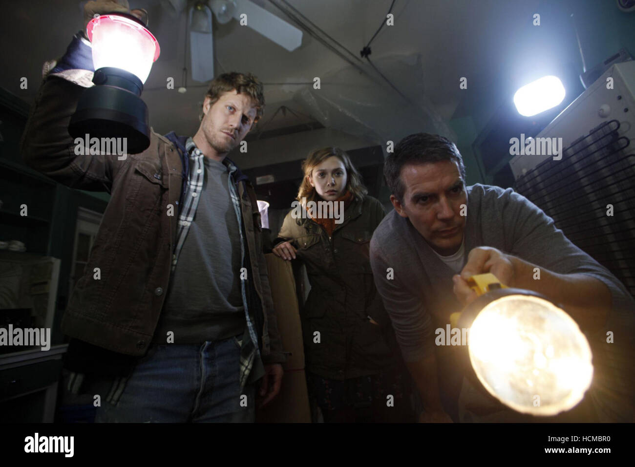 SILENT HOUSE, from left: Eric Sheffer Stevens, Elizabeth Olsen, Adam ...