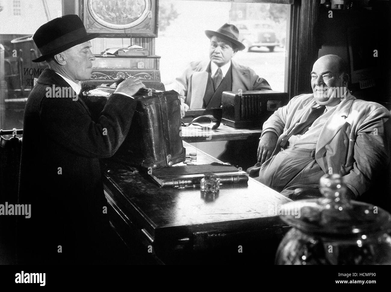 THE STRANGER, from left: Konstantin Shayne, Edward G. Robinson (looking ...