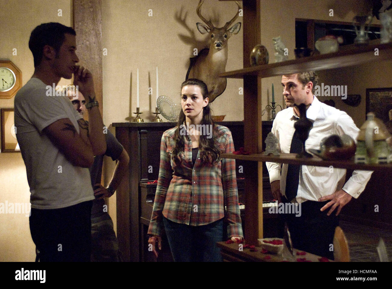 THE STRANGERS, from left: director Bryan Bertino, Liv Tyler, Scott Speedman, on set, 2008 ...
